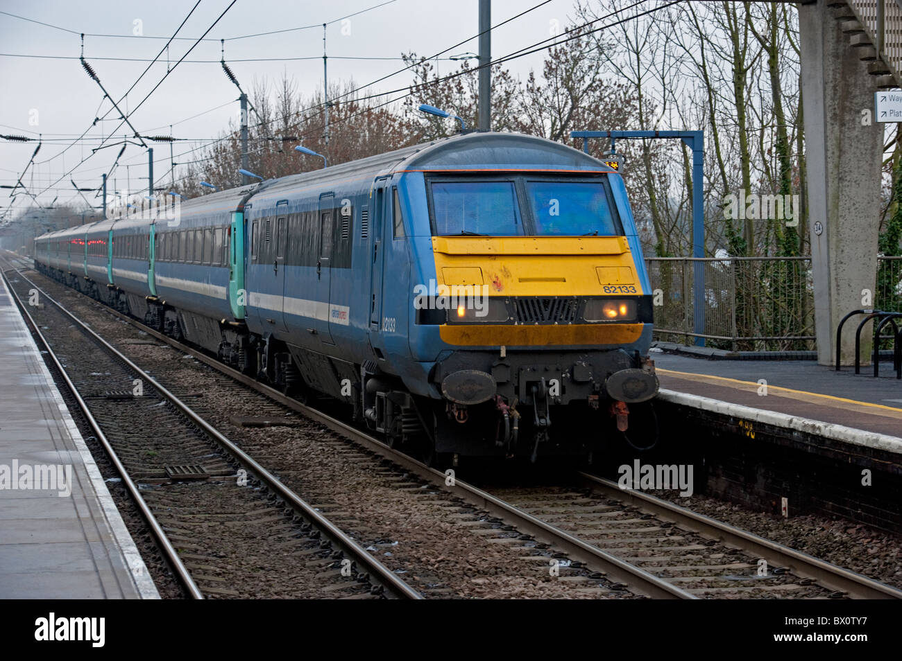 82133 Mark 3 DVT pulls into Diss station platform two bound for Norwich ...
