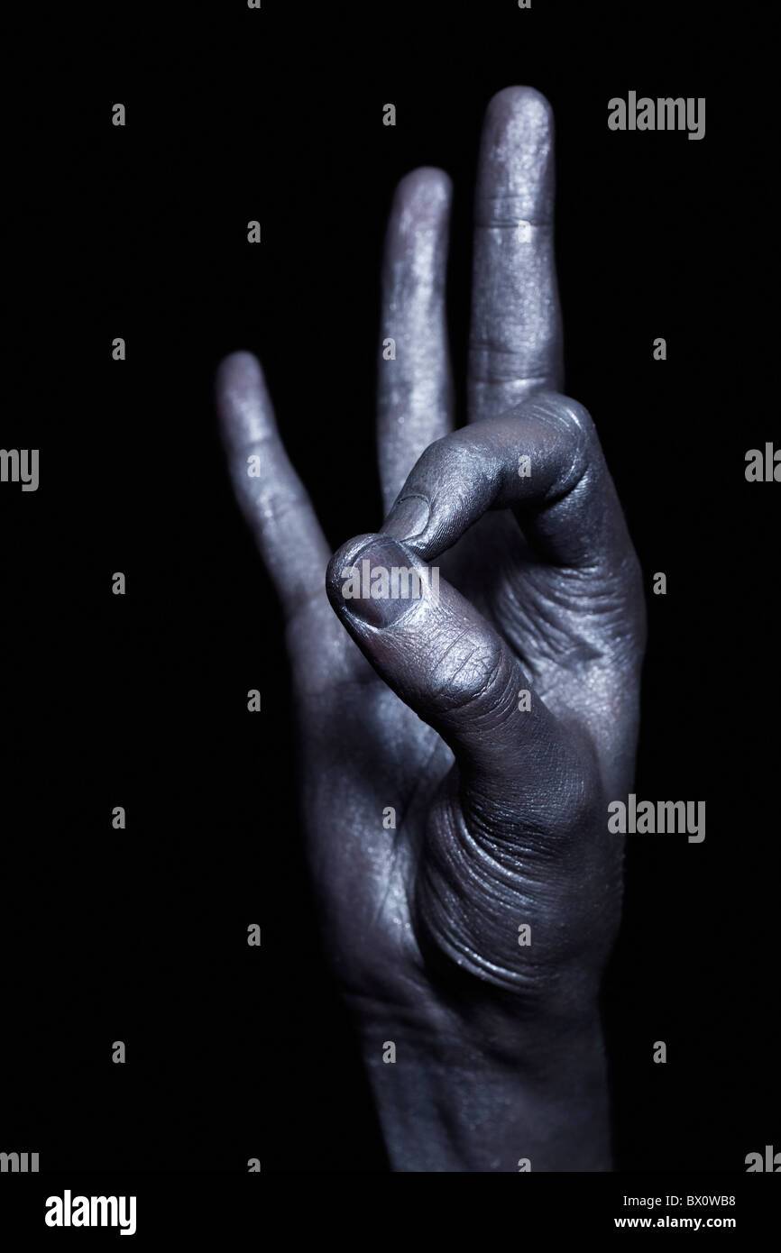 Man in silver body paint hi-res stock photography and images - Alamy