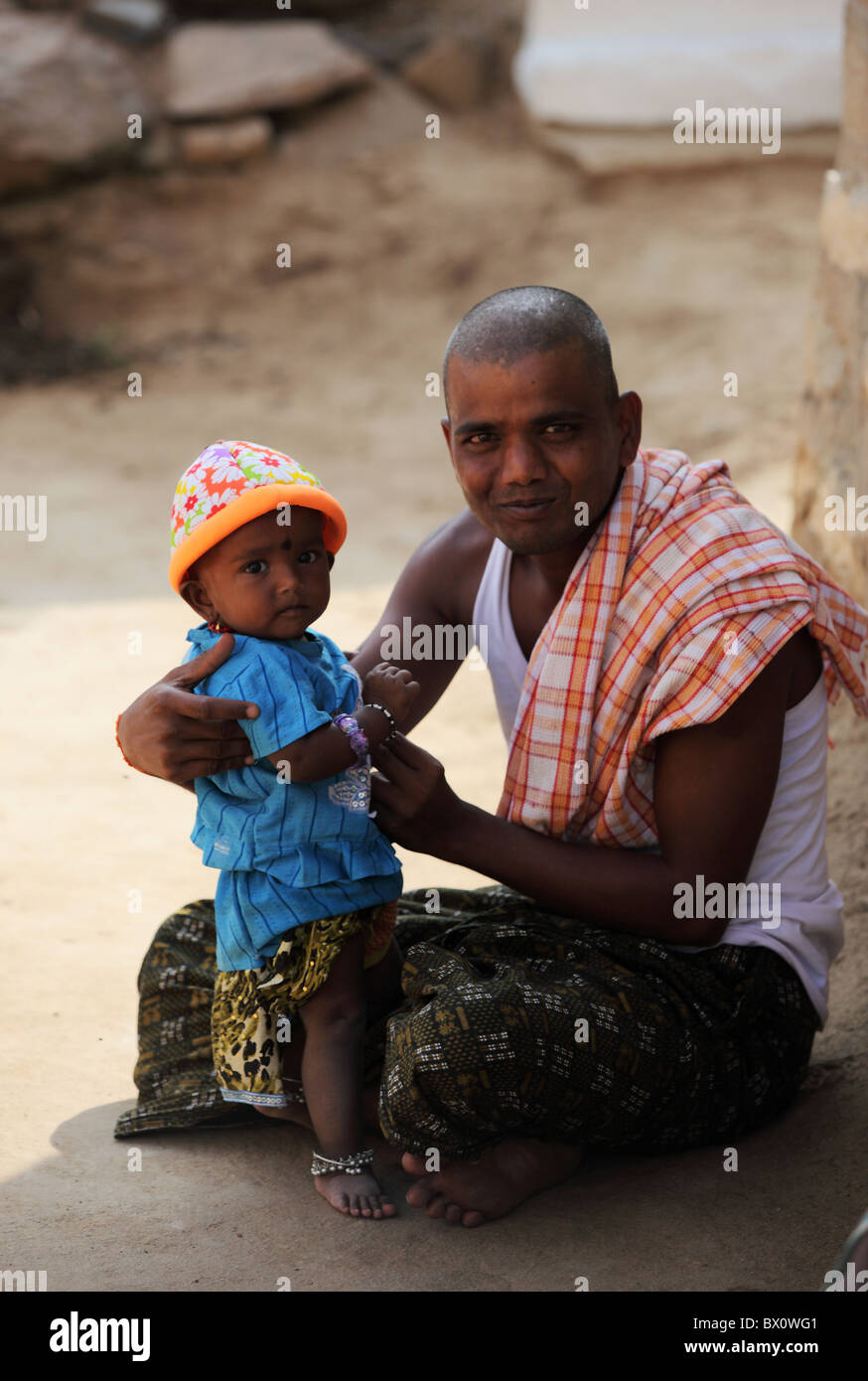 cute little girl with her father Andhra Pradesh South India Stock Photo ...