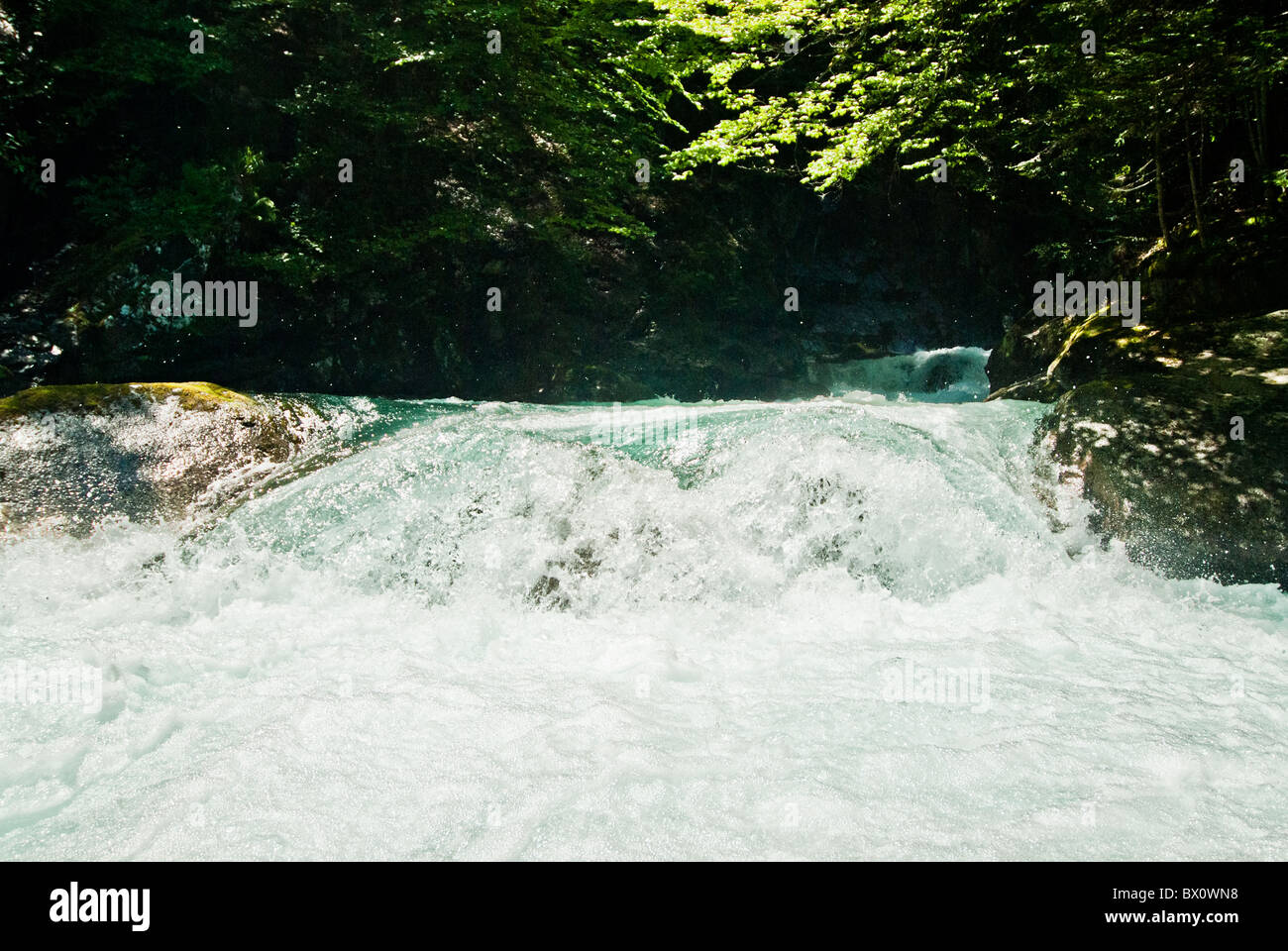 Fast flowing stream Stock Photo - Alamy