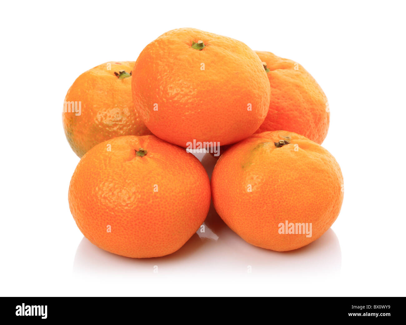 Heap of tangerines isolated on a white background Stock Photo - Alamy