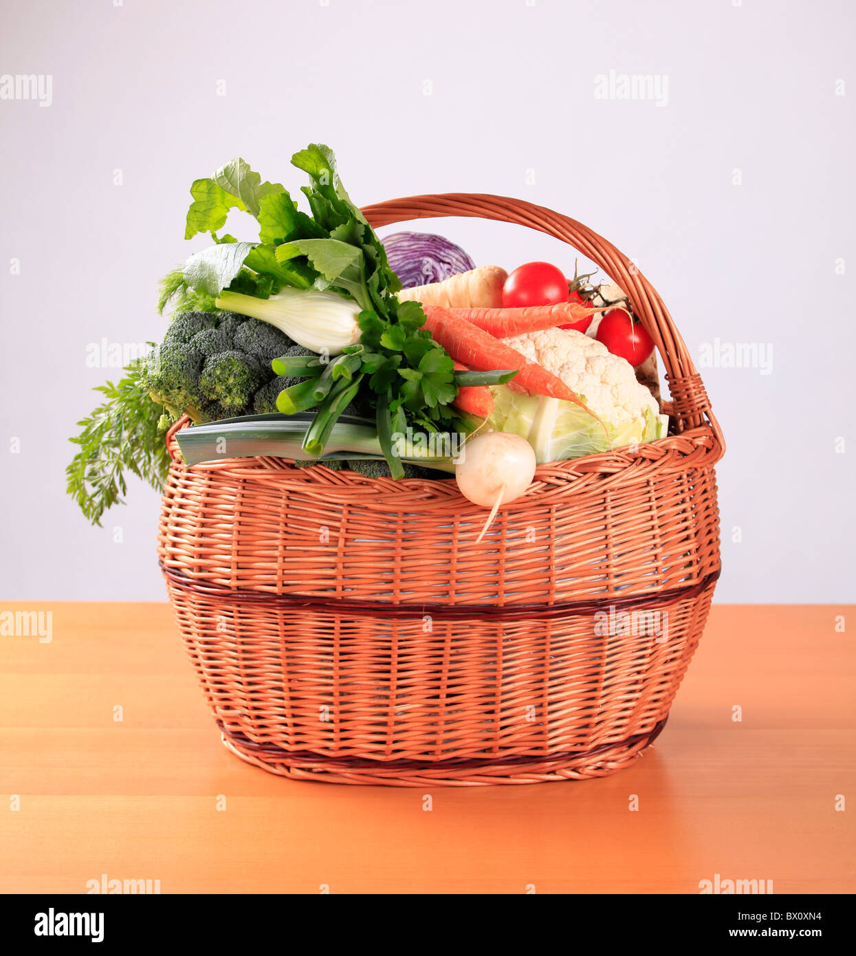 Variety of fresh vegetables in a basket Stock Photo - Alamy