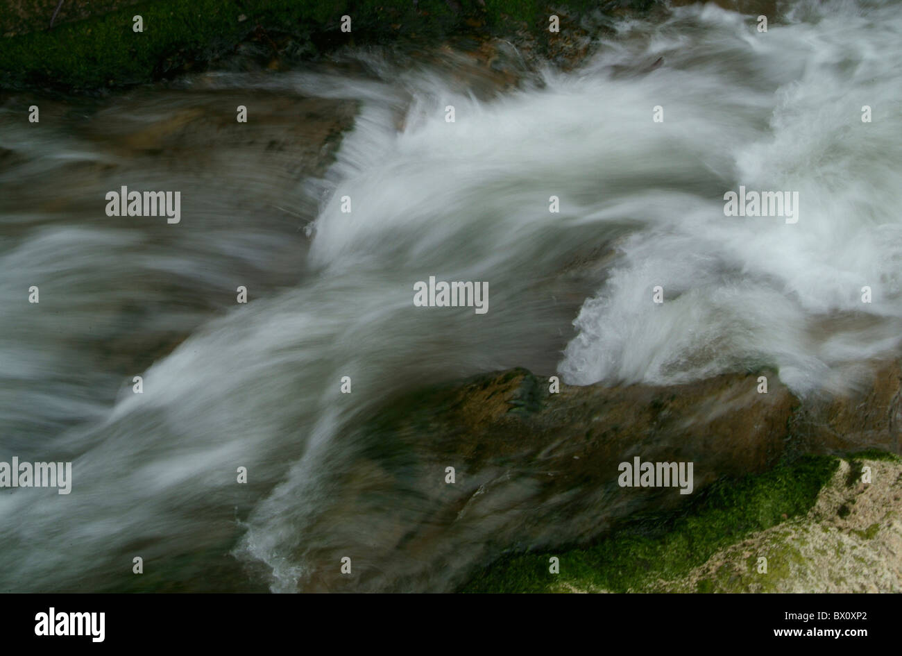 Water rushing through culvert Stock Photo - Alamy