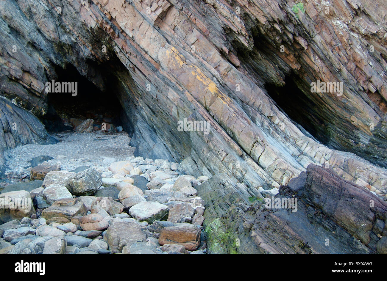 Caves in bay at Combe Martin, Devon, uk Stock Photo - Alamy