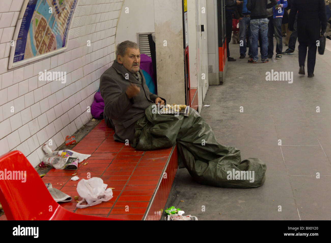 homeless men in station at the Paris metro, France Stock Photo - Alamy