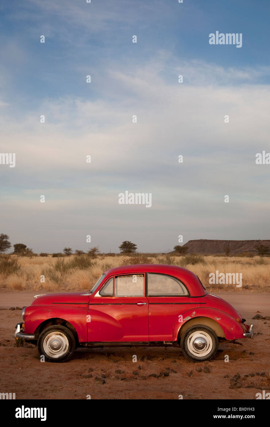 Red Morris Minor 1000 in the desert, Namibia Stock Photo - Alamy