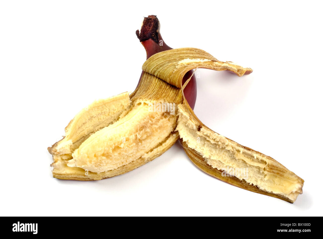 Peeled red banana close up isolated on white background Stock Photo - Alamy