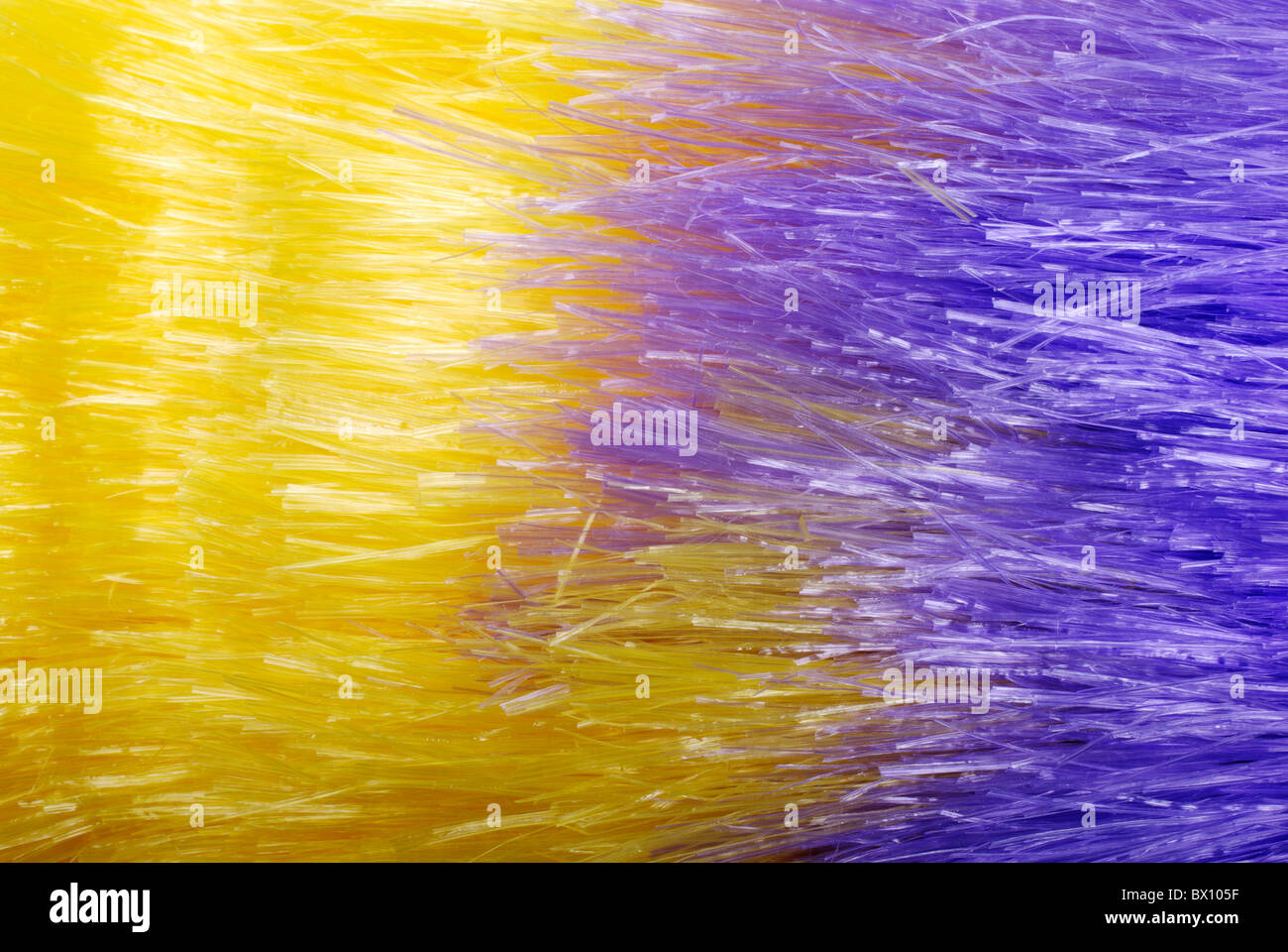 Yellow with blue color duster cleaner macro as background Stock Photo ...