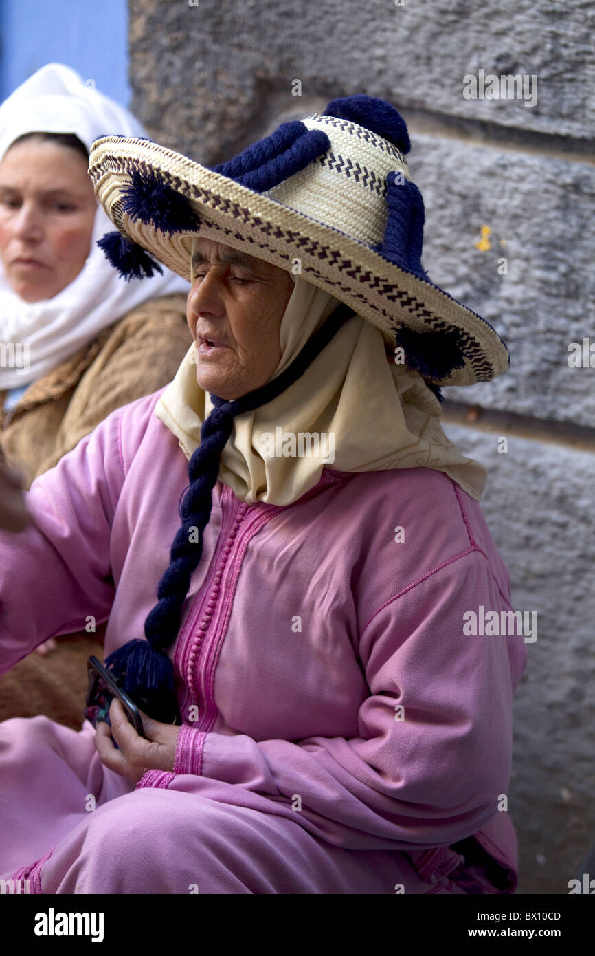 woman street trader dressed in traditional clothing,Chefchaouen,Morocco ...