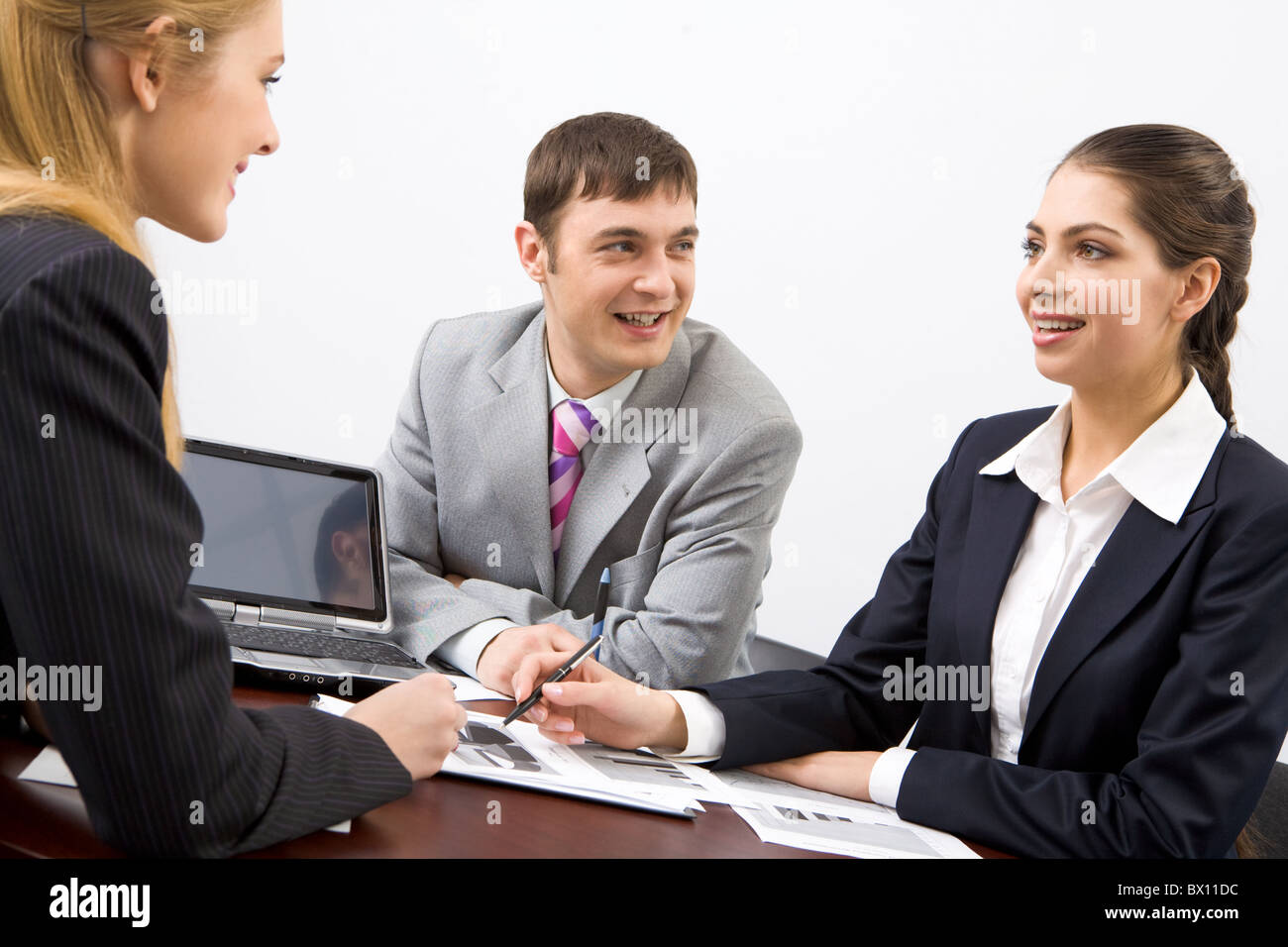 Image of business group discussing new project or plan in the office ...