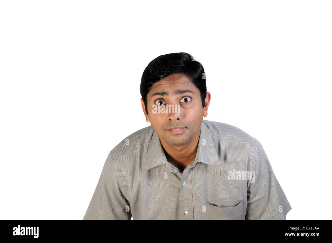 An handsome indian man looking very excited Stock Photo - Alamy