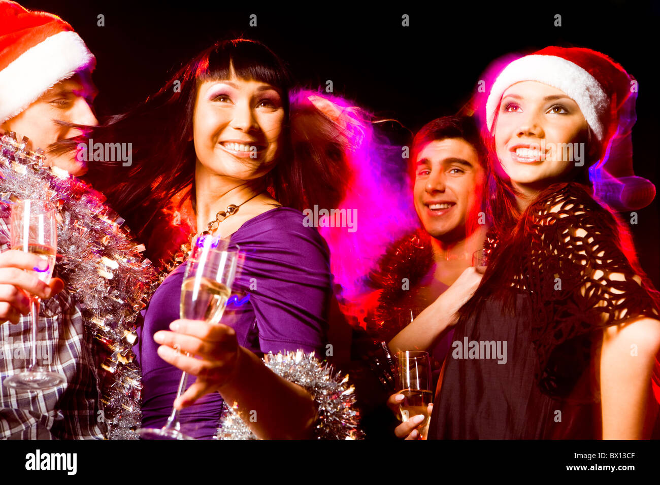 Image of joyful friends having fun at disco in night club at party ...