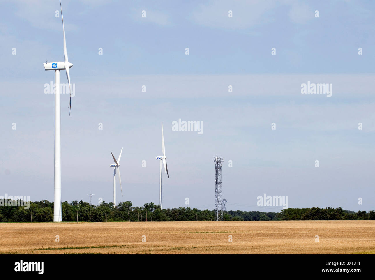 Relay station and windmills Stock Photo - Alamy