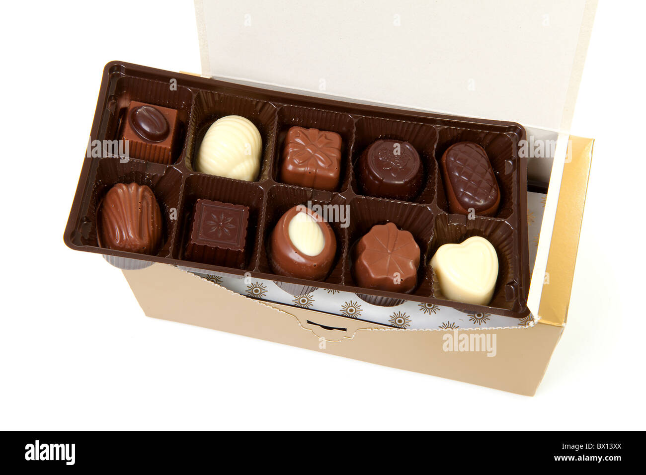 chocolate bonbons in box over white background Stock Photo - Alamy