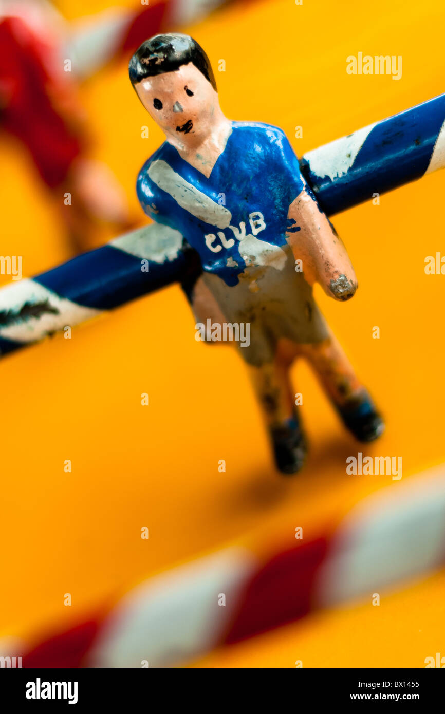 Table football player in blue shirt Stock Photo - Alamy