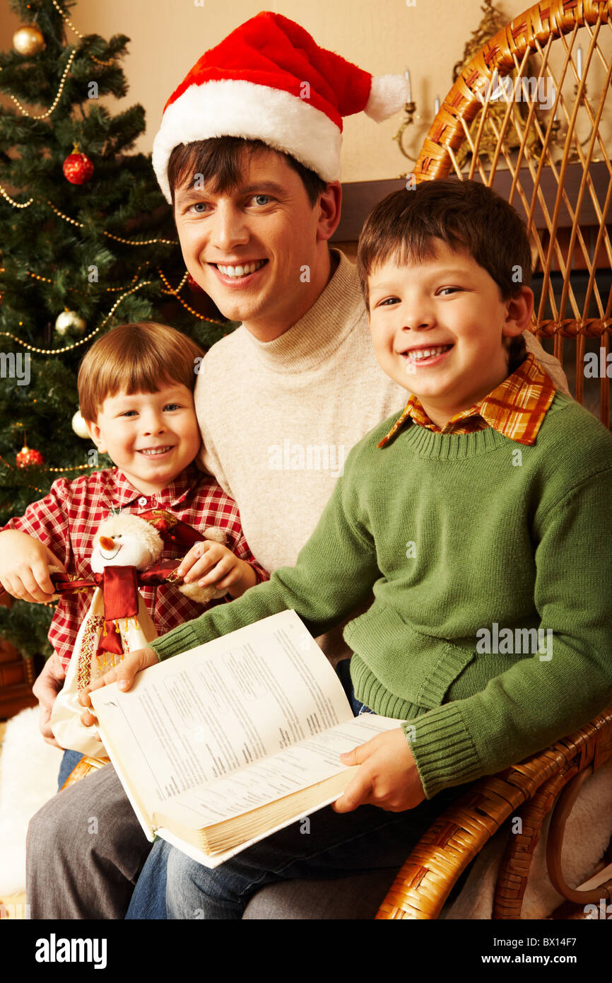 Father christmas holding book hi-res stock photography and images - Alamy