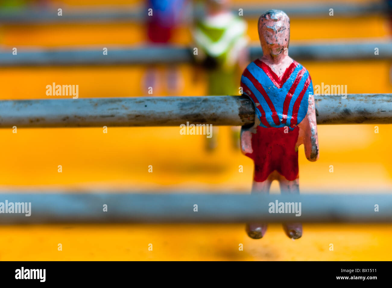 Table football player in red and blue shirt Stock Photo - Alamy