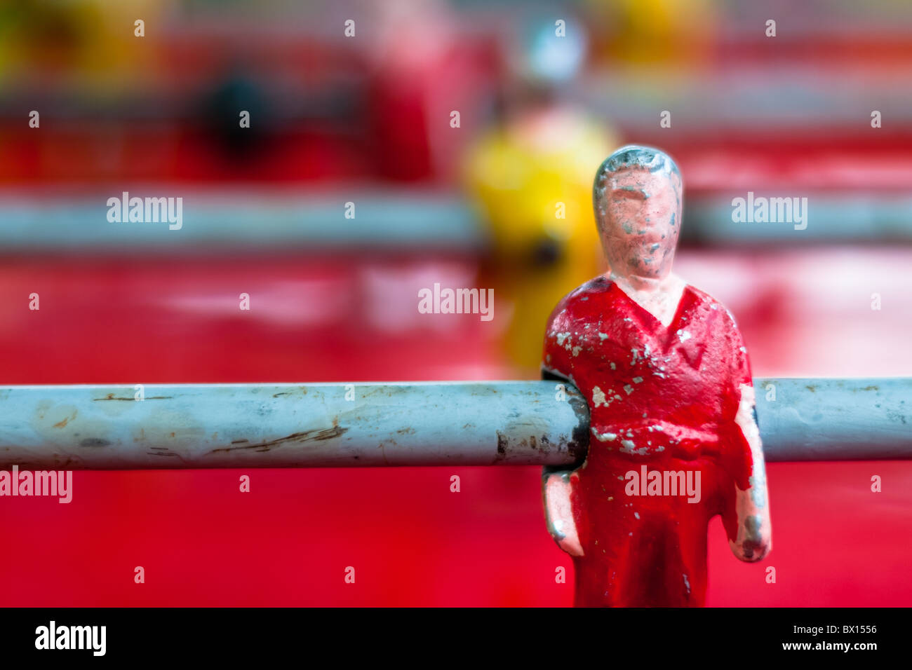 Table football player in red shirt Stock Photo - Alamy