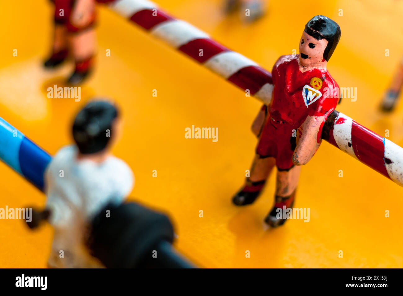 Table football player in red shirt Stock Photo - Alamy