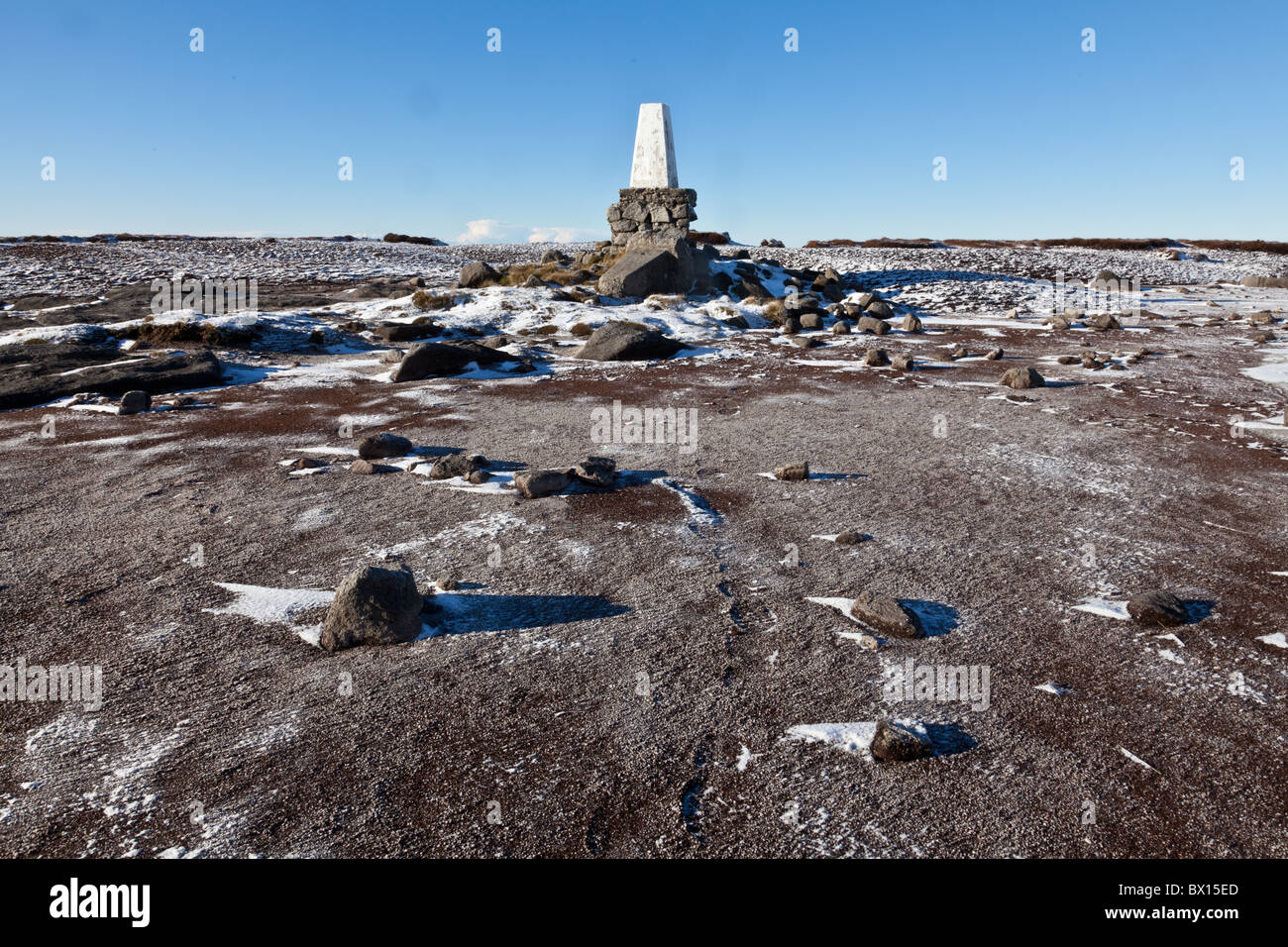 Trig point in winter on Kinder Scout in the Dark Peak part of the Peak ...