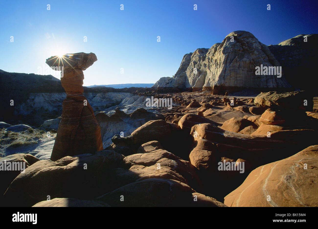 back light blue sky broadness cliff cliff formation desert desolate ...