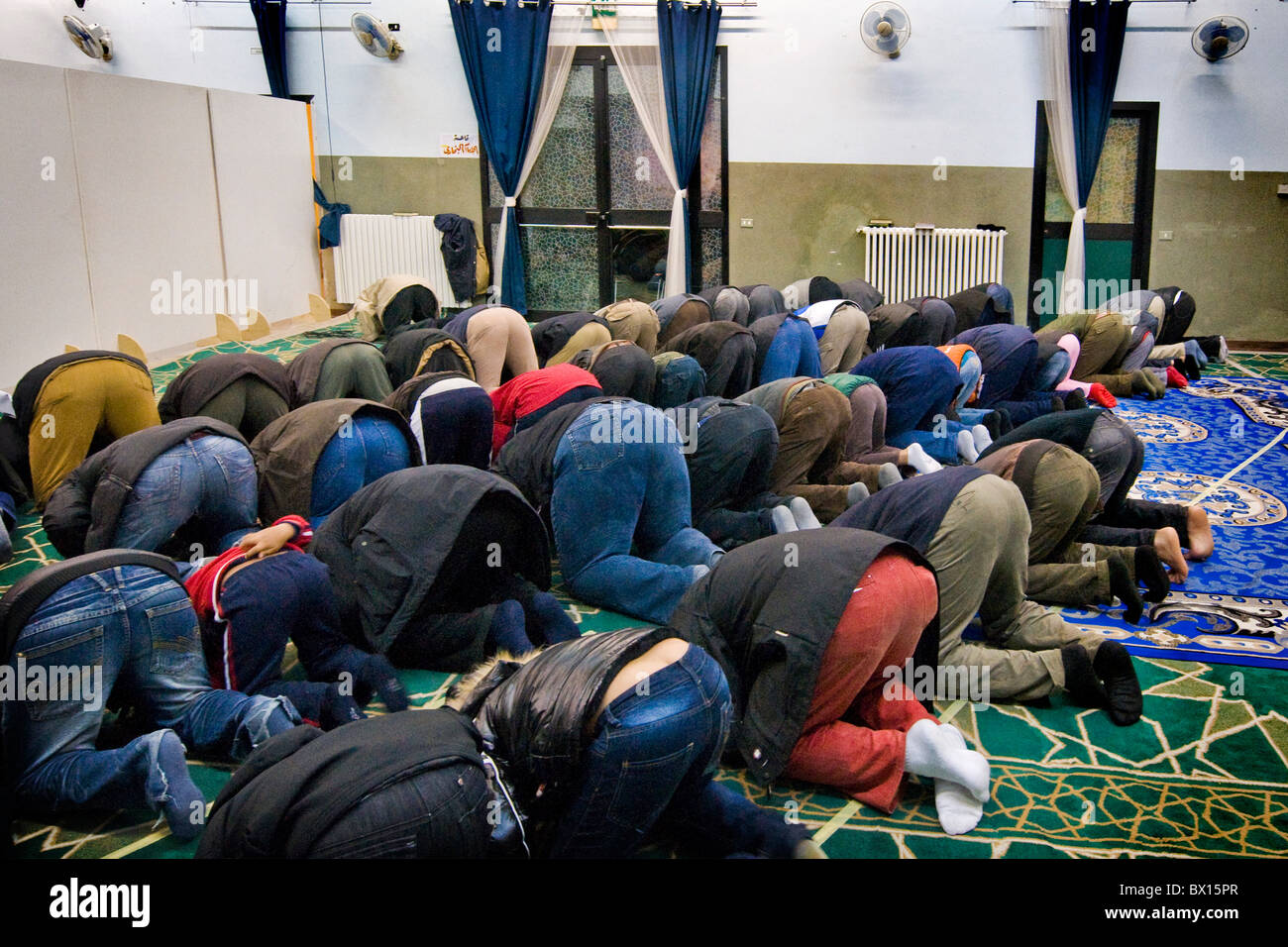 The afternoon prayer. Al-Rahmàn Mosque, Segrate, Italy Stock Photo - Alamy