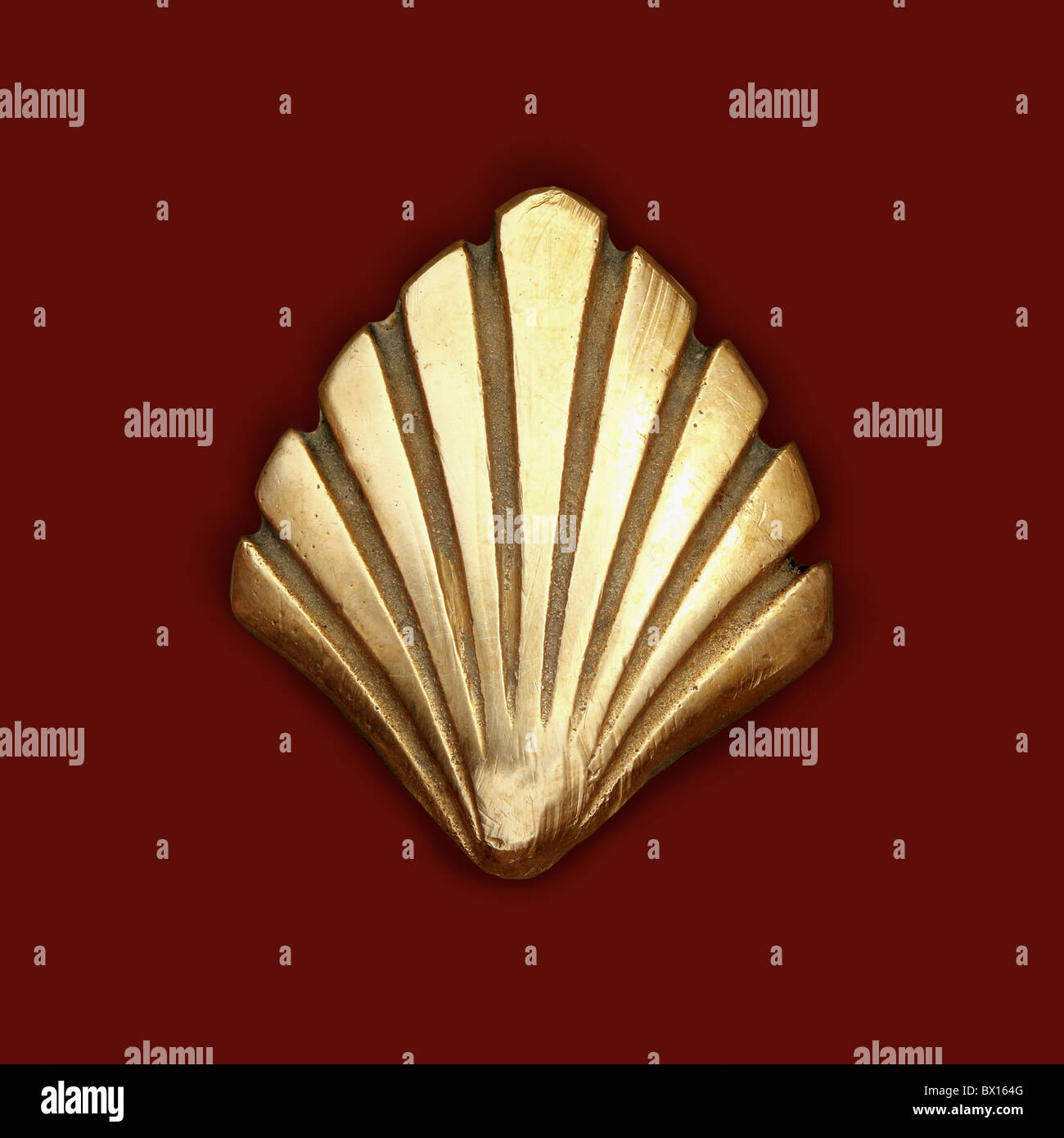 Way of Saint James symbol shell golden metal isolated Stock Photo - Alamy