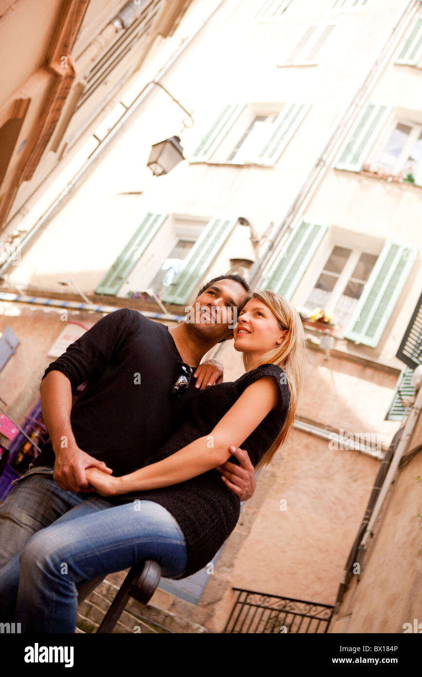 A happy french couple in a small quaint street Stock Photo - Alamy