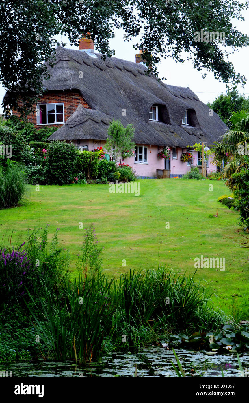 thatched cottage aon the banks of the river stour at throop bournemouth ...