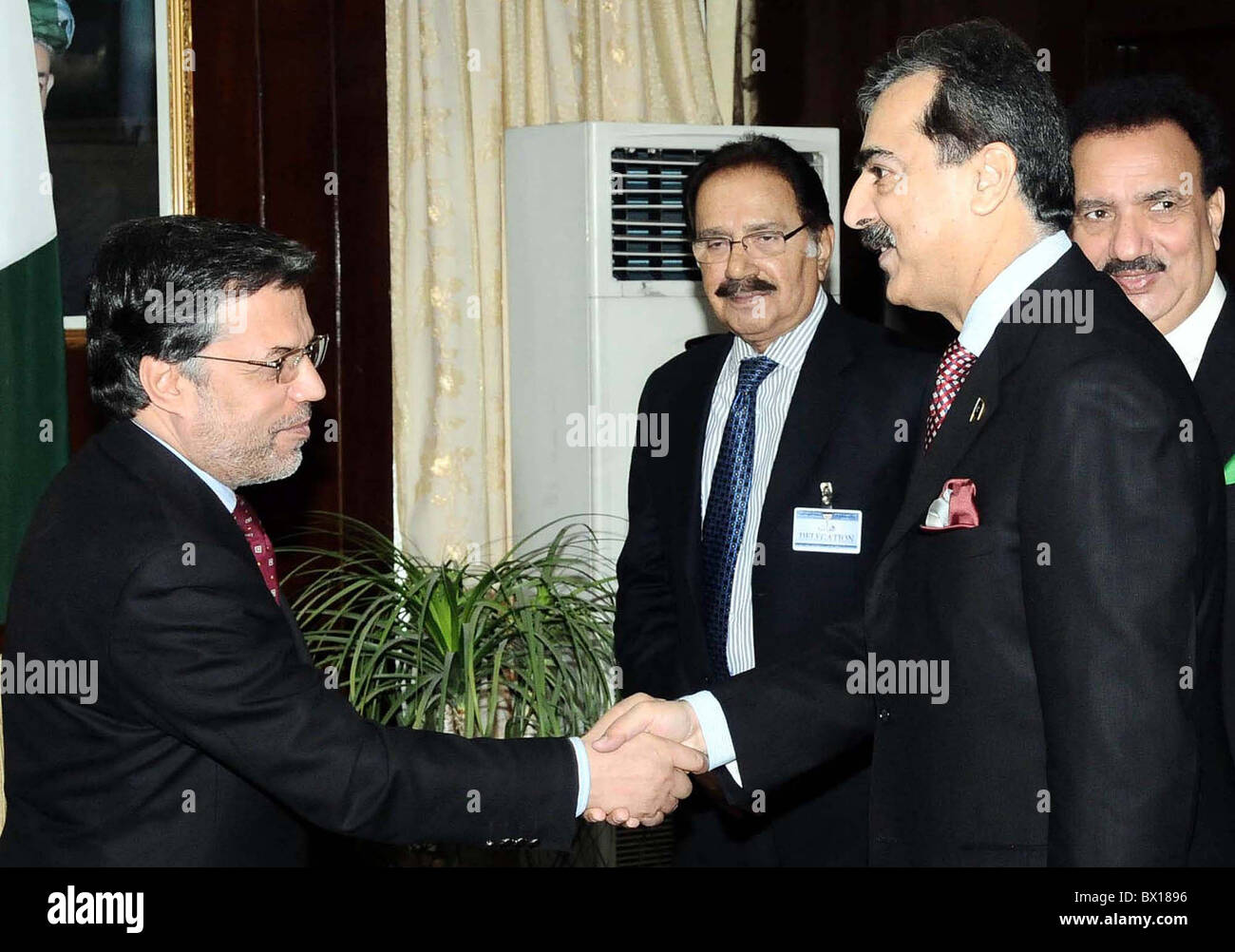 Prime Minister, Syed Yousuf Raza Gilani shakes hand with Afghanistan ...