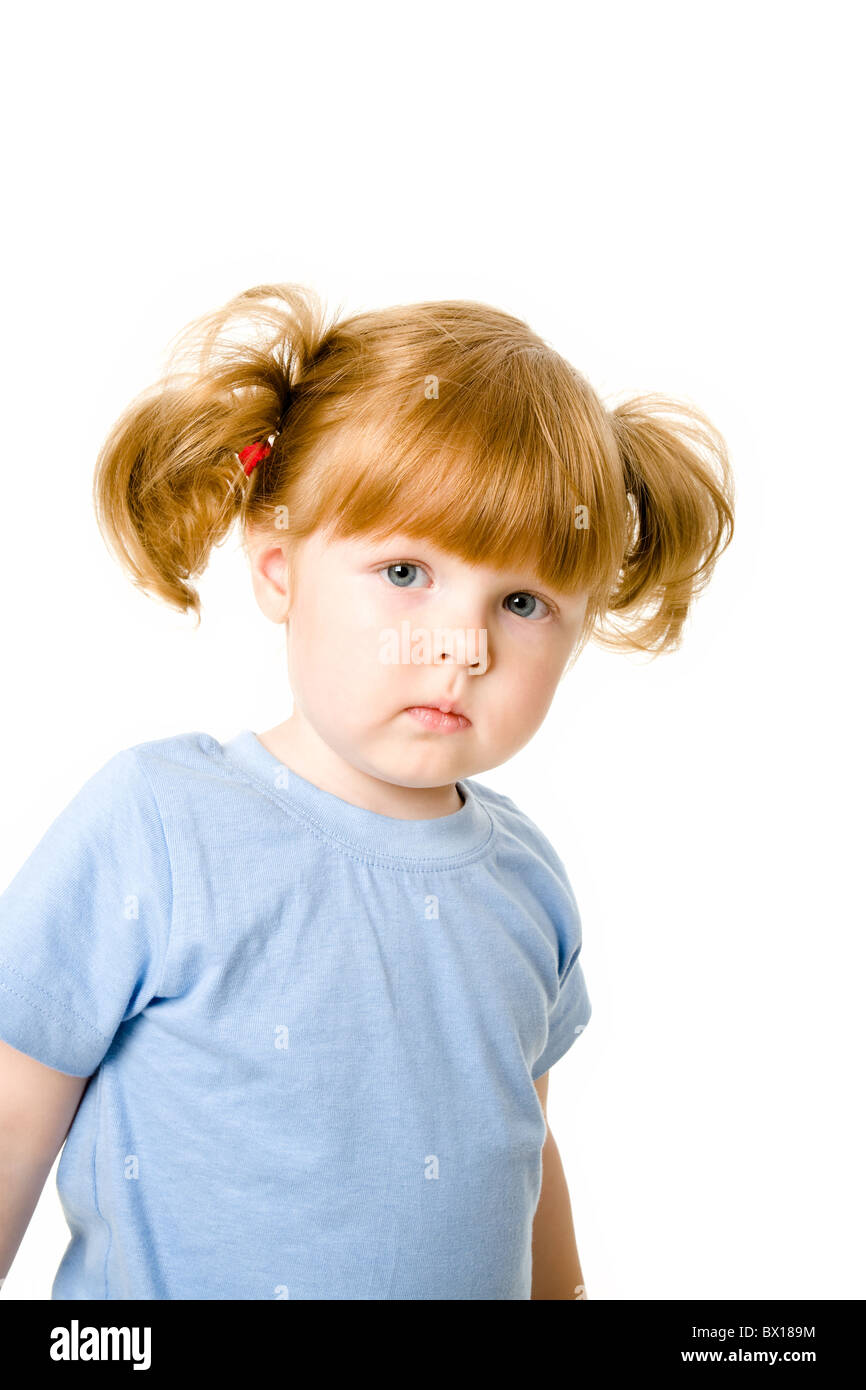 Portrait of small girl looking at camera on a white background Stock ...