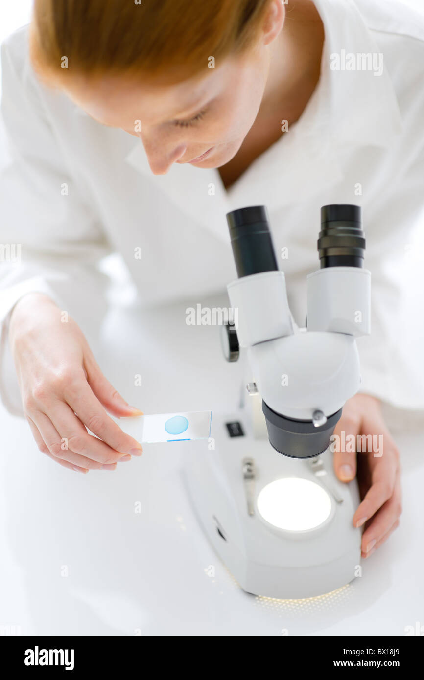 Microscope laboratory - woman medical research chemist experiment ...