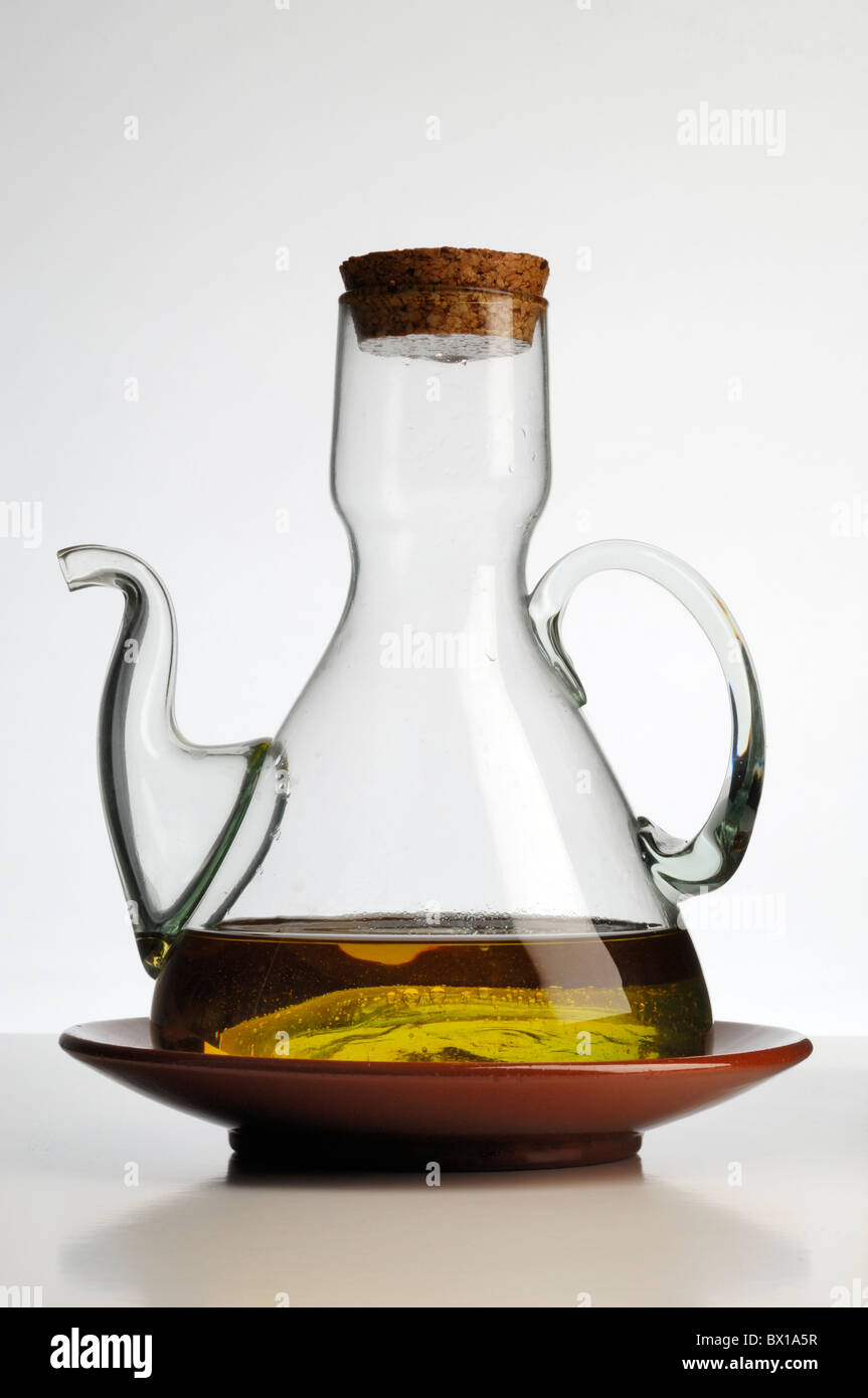 Oil cruet over white background Stock Photo - Alamy