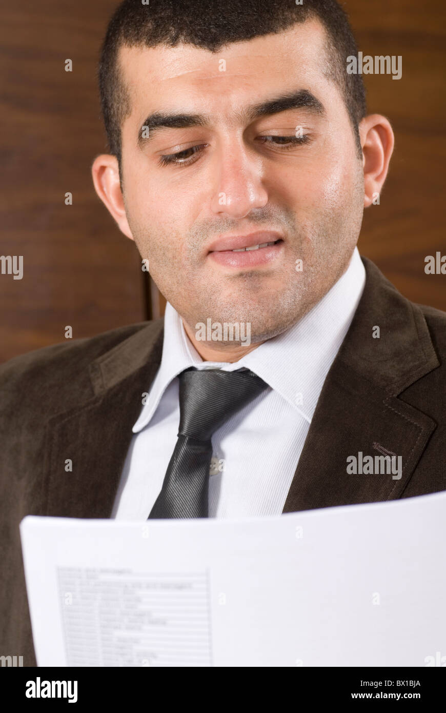 Middle eastern businessman reading hi-res stock photography and images ...