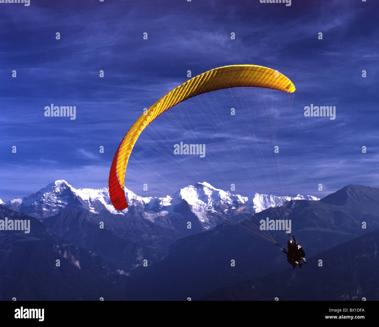 Paraglider flying Paragliding Jungfrau Monch Eiger Bernese Oberland ...