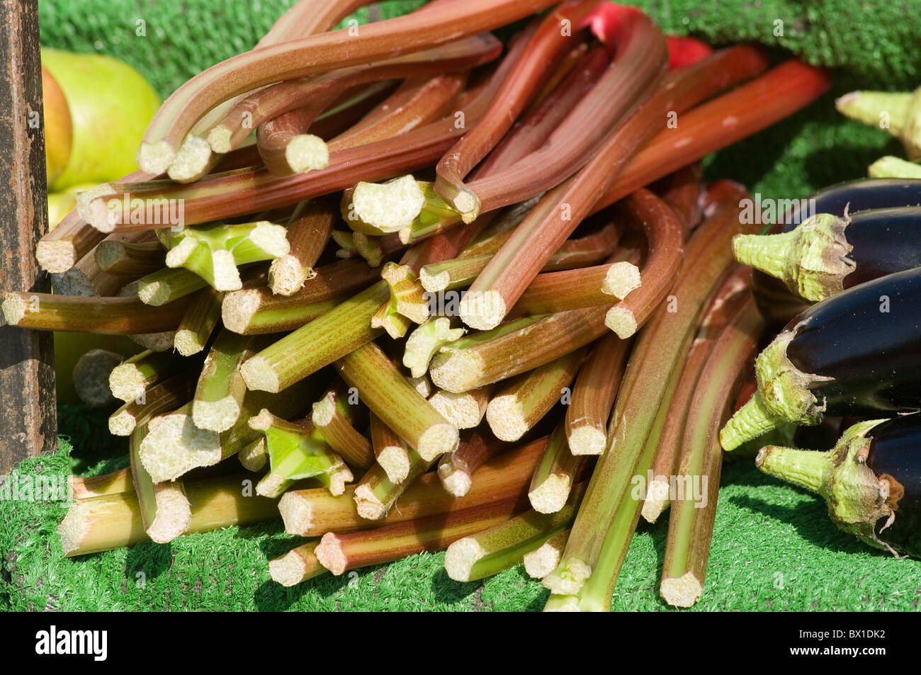 Fresh rhubarb on stall hi-res stock photography and images - Alamy