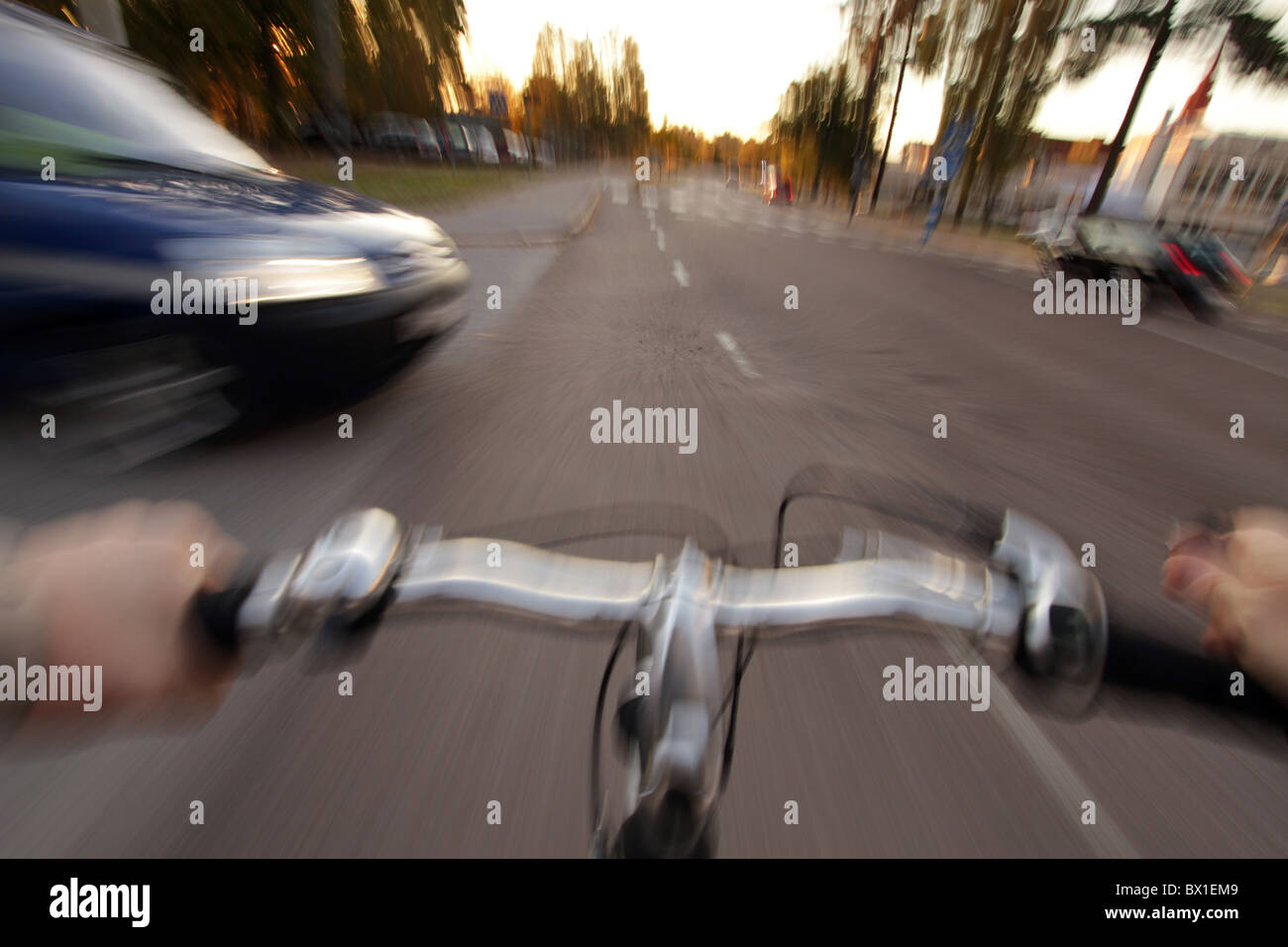 Bicycle just about to be hit by a car Stock Photo - Alamy