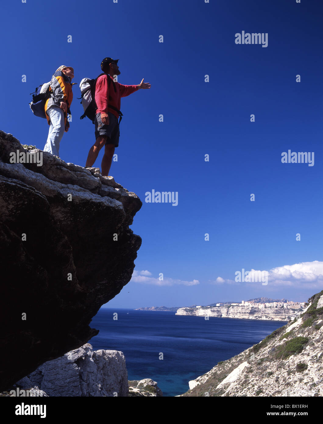 Hiking couple cliff projection coast sea Mediterranean Sea rock scenery ...