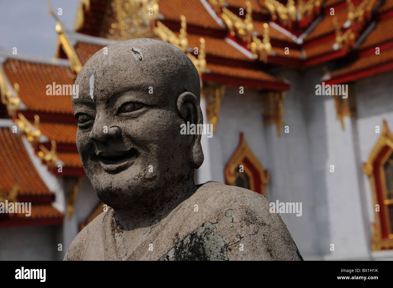 A smiling Buddha in Marble Temple in Bangkok Stock Photo - Alamy