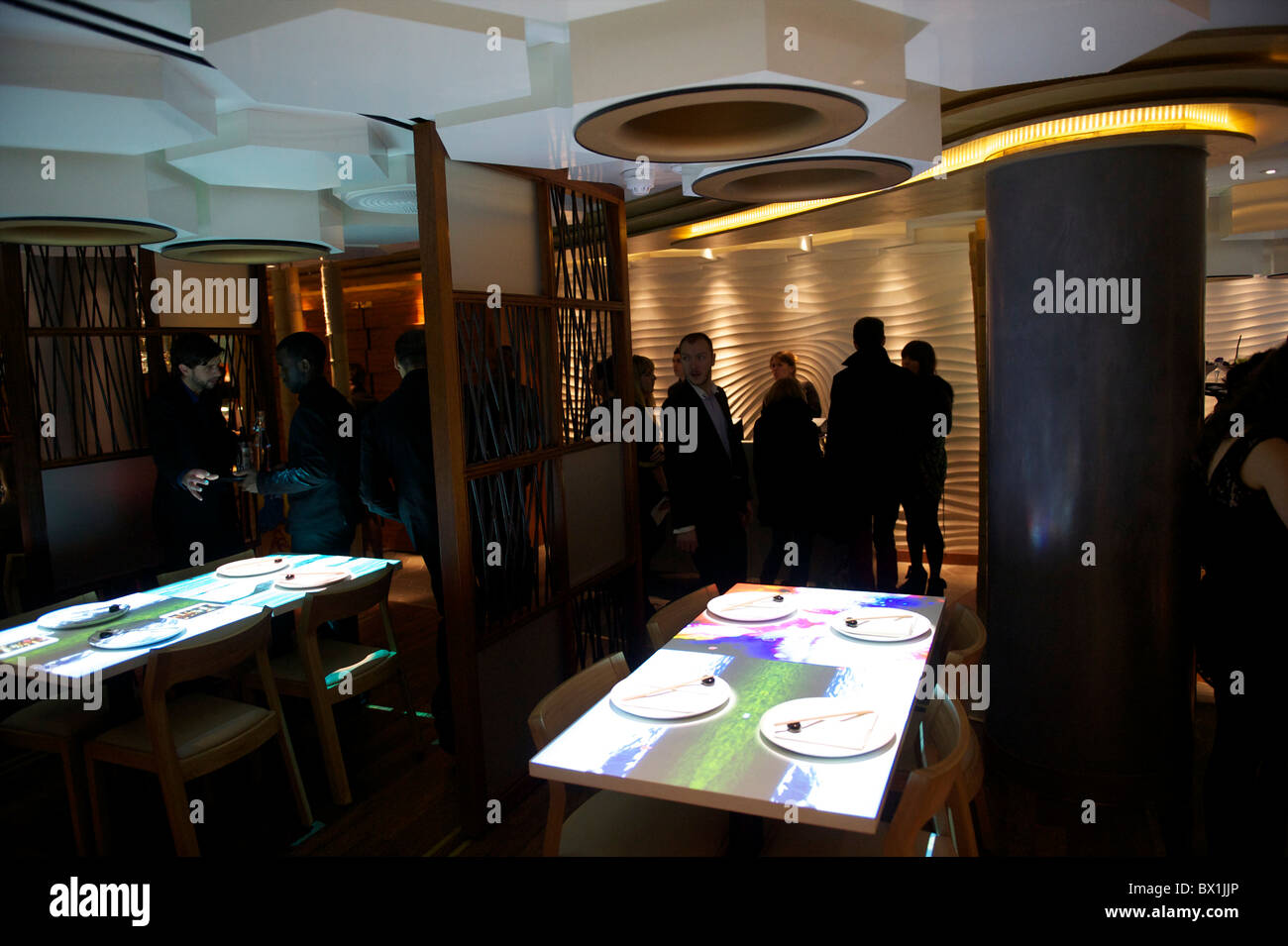 Guests attend the restaurant opening of Inamo St. James in London on ...