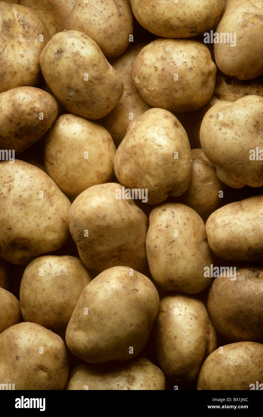 Potatoes filling frame Vertical Stock Photo - Alamy