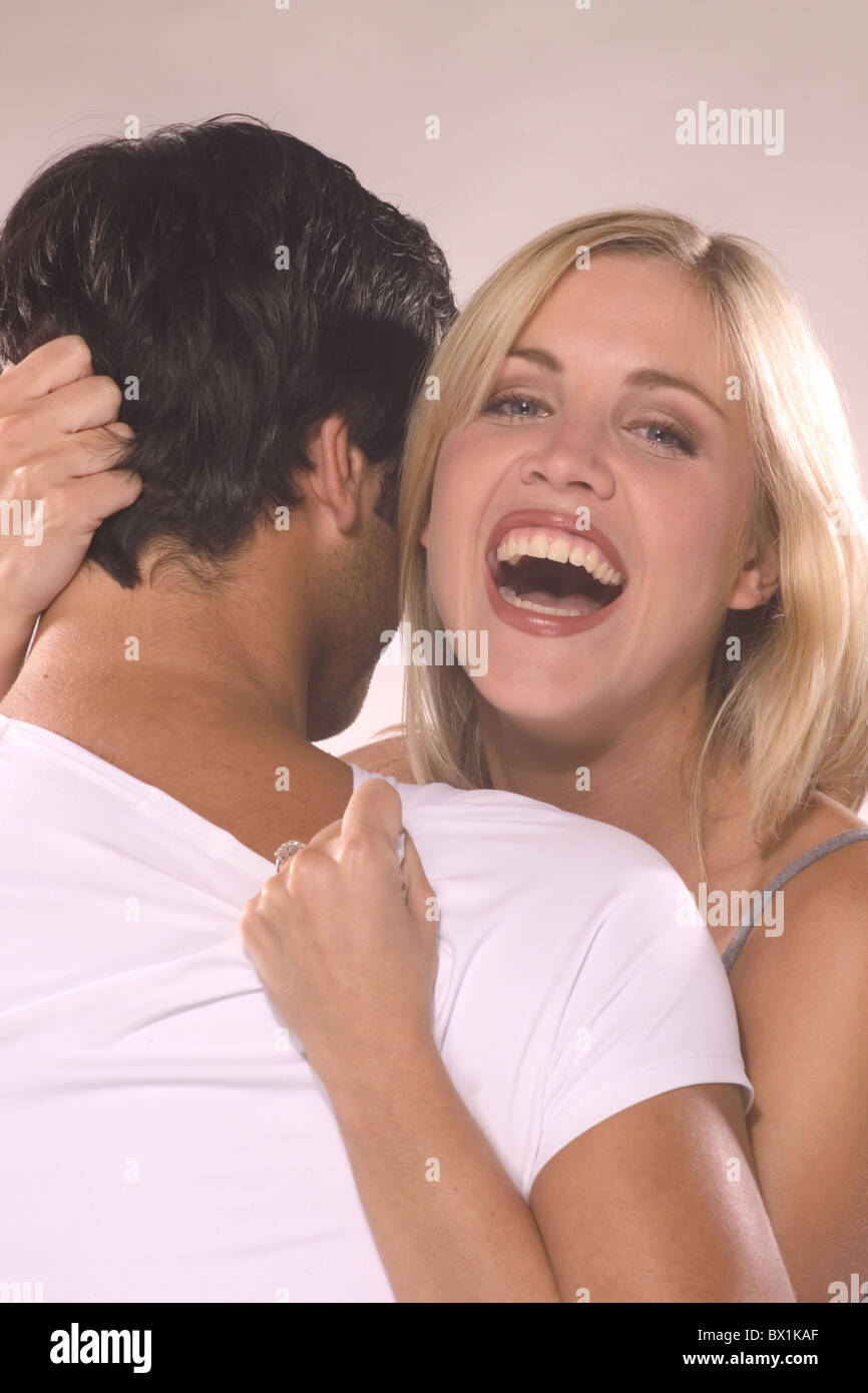 Couple embrace embracing fun joke laughing portraits studio Stock Photo ...