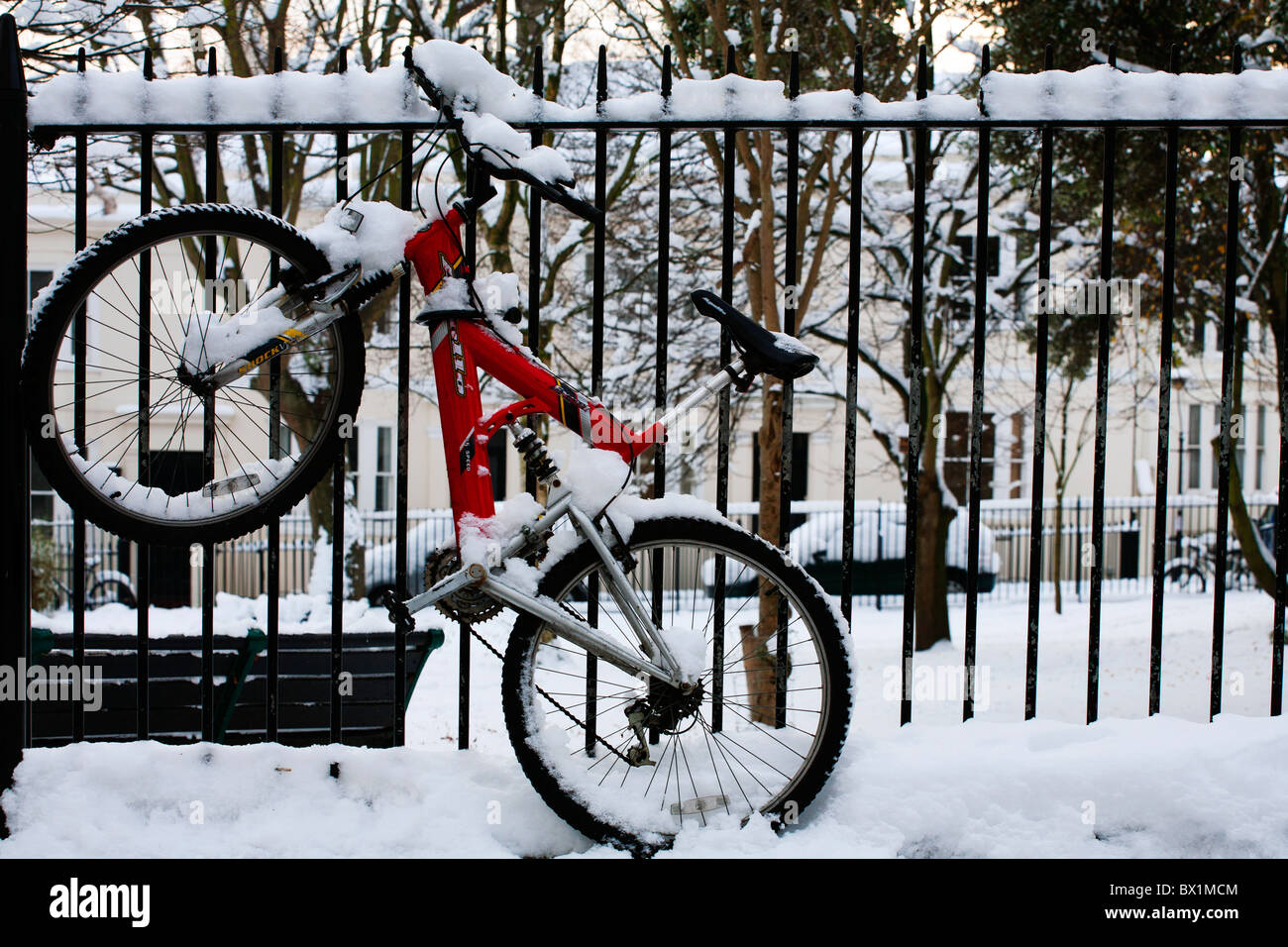 Red bike snow hi-res stock photography and images - Alamy