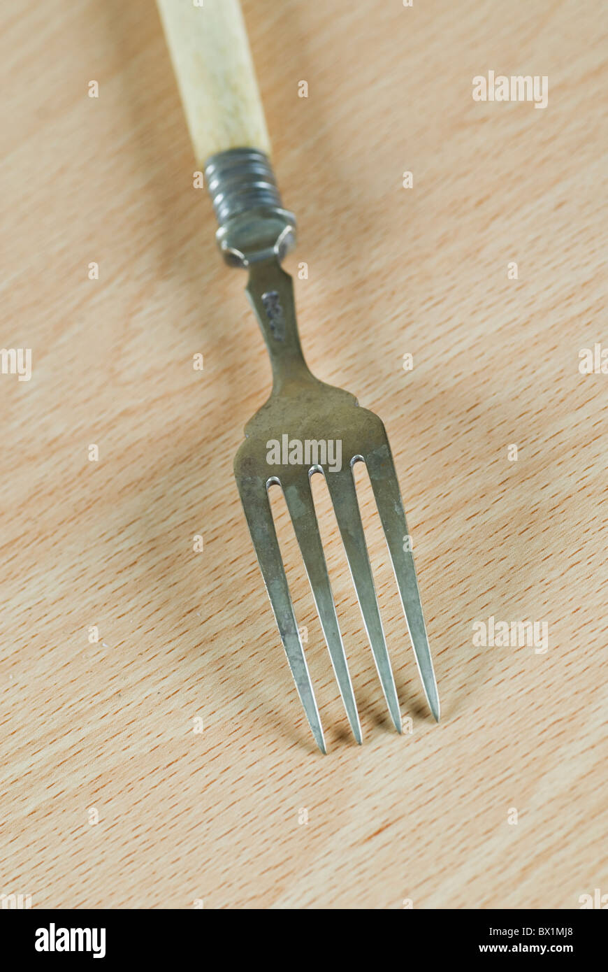 Old silver eating fork utensil Stock Photo - Alamy
