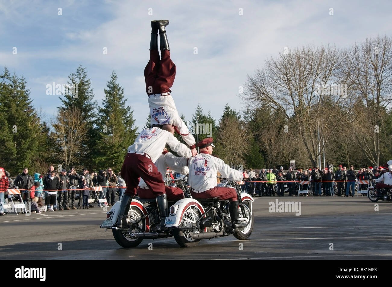 Members of the Seattle Cossacks Motorcycle Stunt team perform for the ...