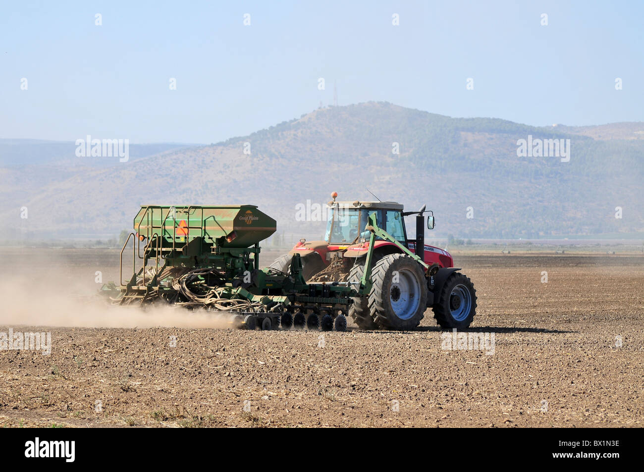 Israel, Hula Valley, Tractor ploughs and tills a field Stock Photo - Alamy