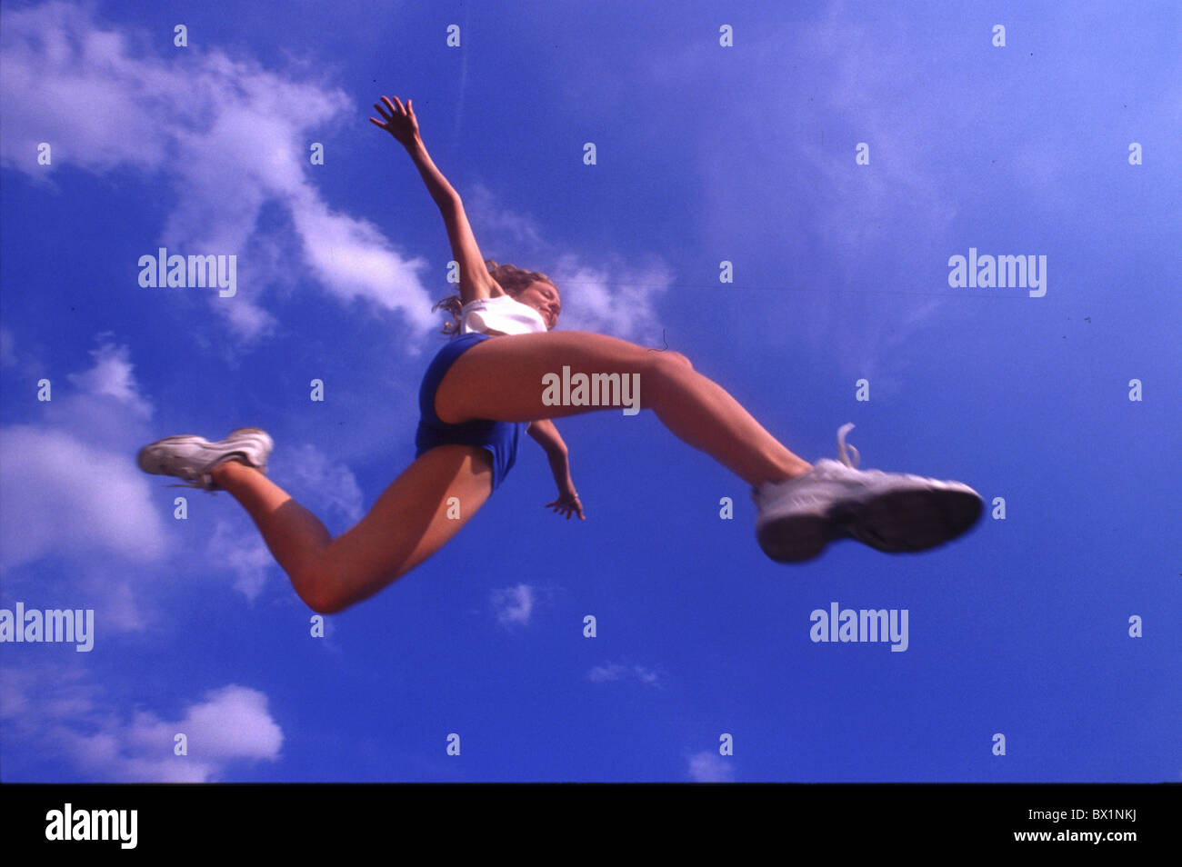 action Dynamic fitness from below high jump legs overcome sky sports ...