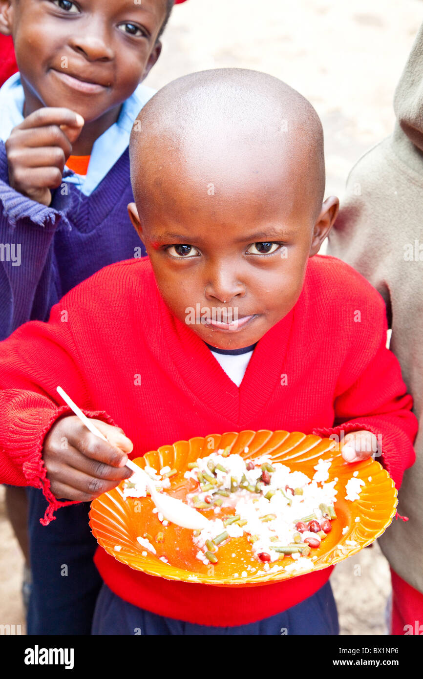 Africa child eating hi-res stock photography and images - Alamy