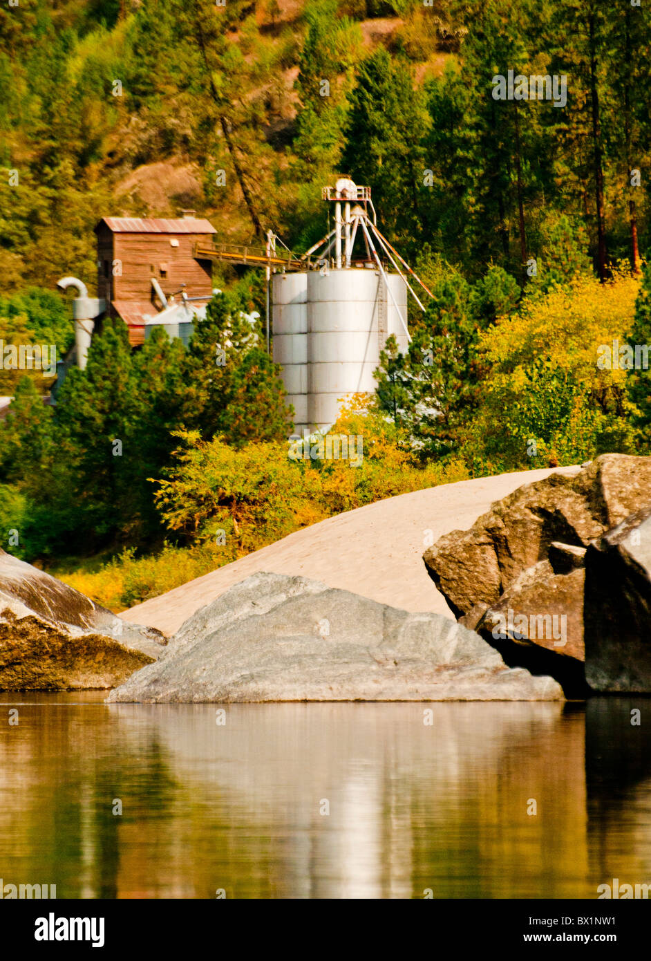 USA, Idaho, Agriculture, Farming, Wheat granary reflecting fall colors ...