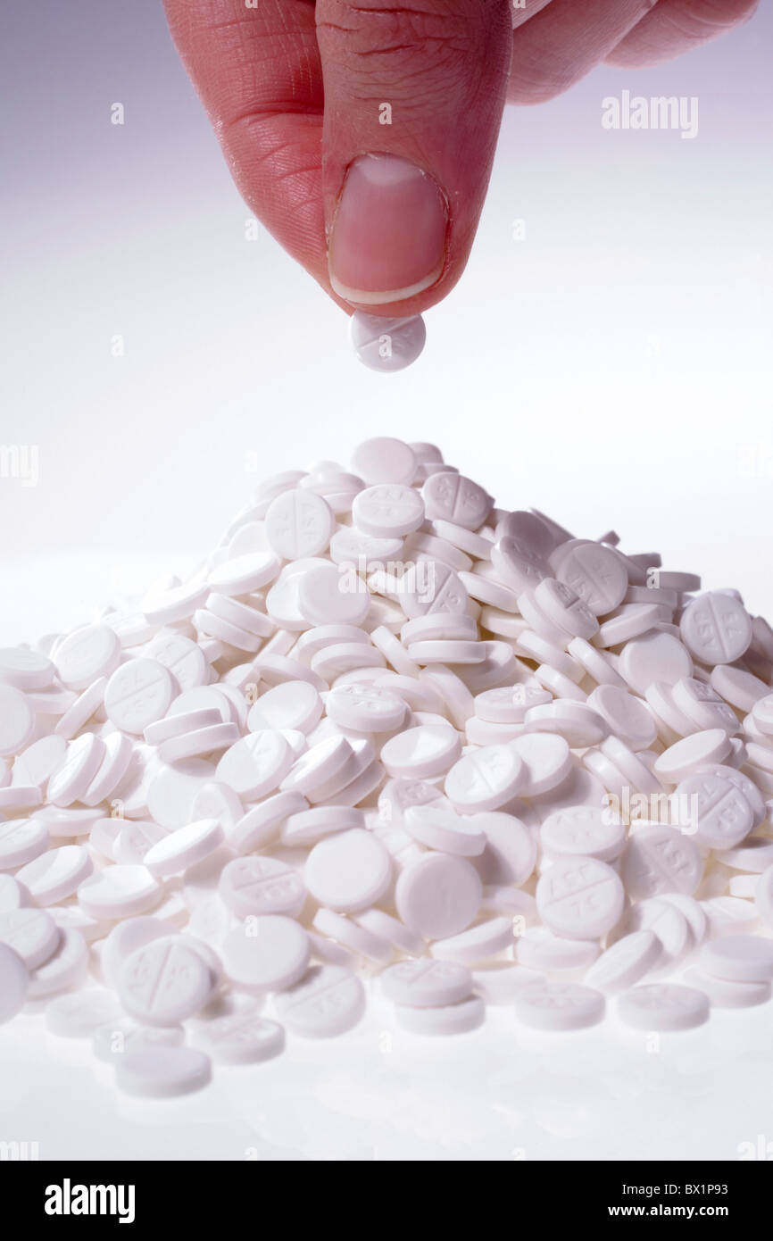 Tablets medicines concepts heaps hand medicine studio Stock Photo - Alamy